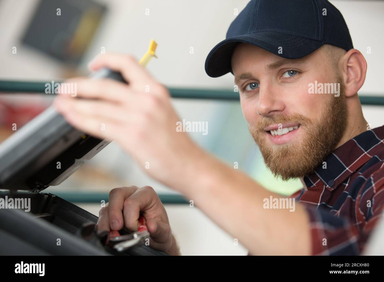 man opening a tool box Stock Photo - Alamy