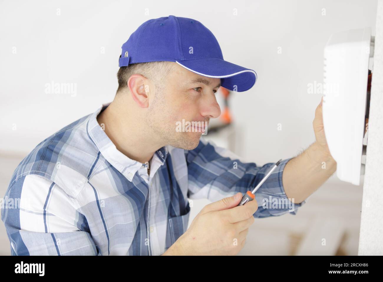 Electrician working fusebox hi-res stock photography and images - Alamy
