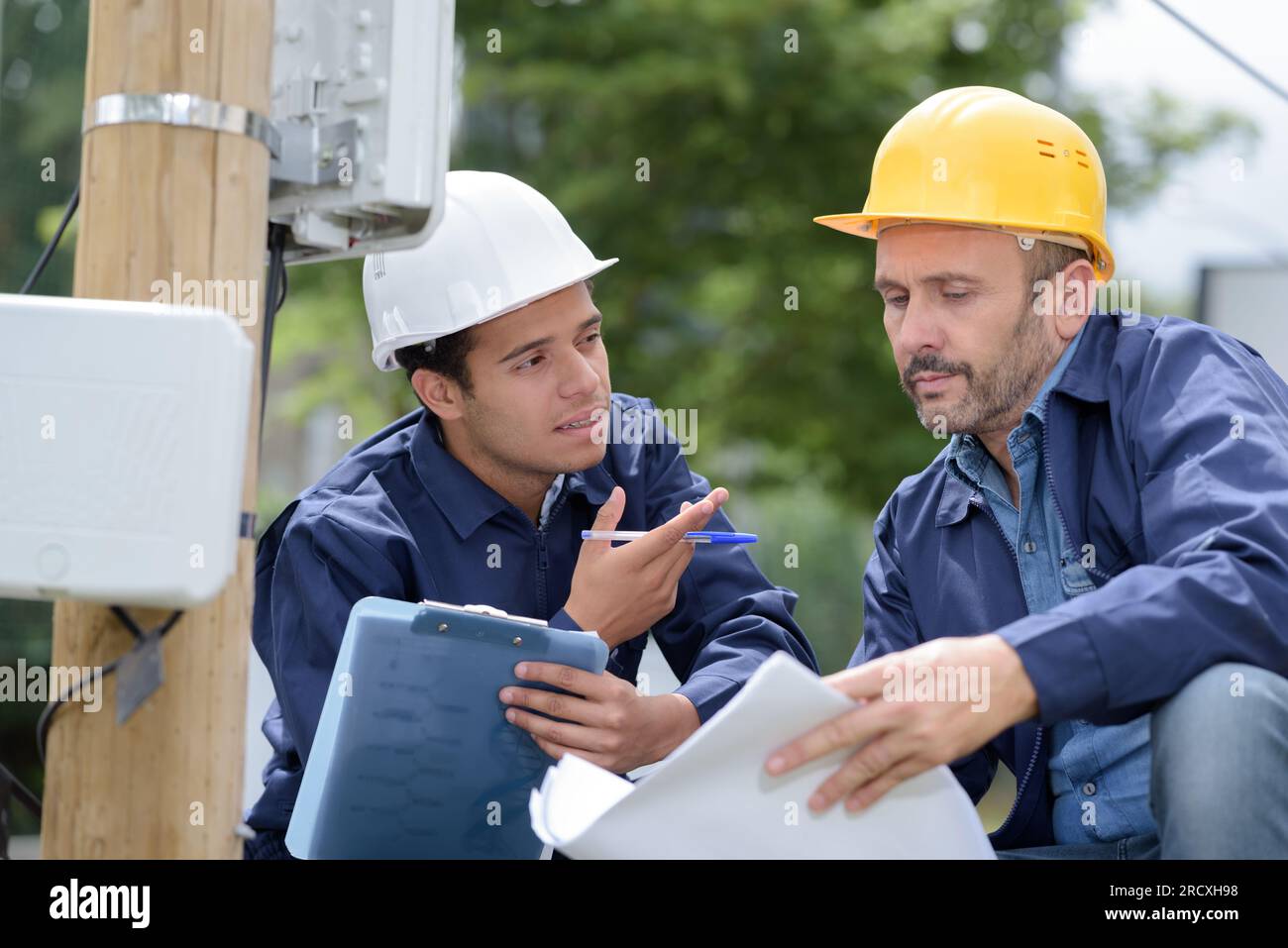 the two civil engineers talking Stock Photo - Alamy