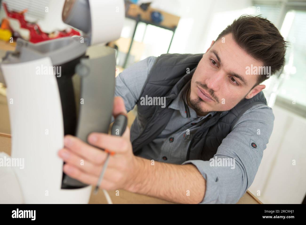 professional worke fixing coffee machine Stock Photo - Alamy