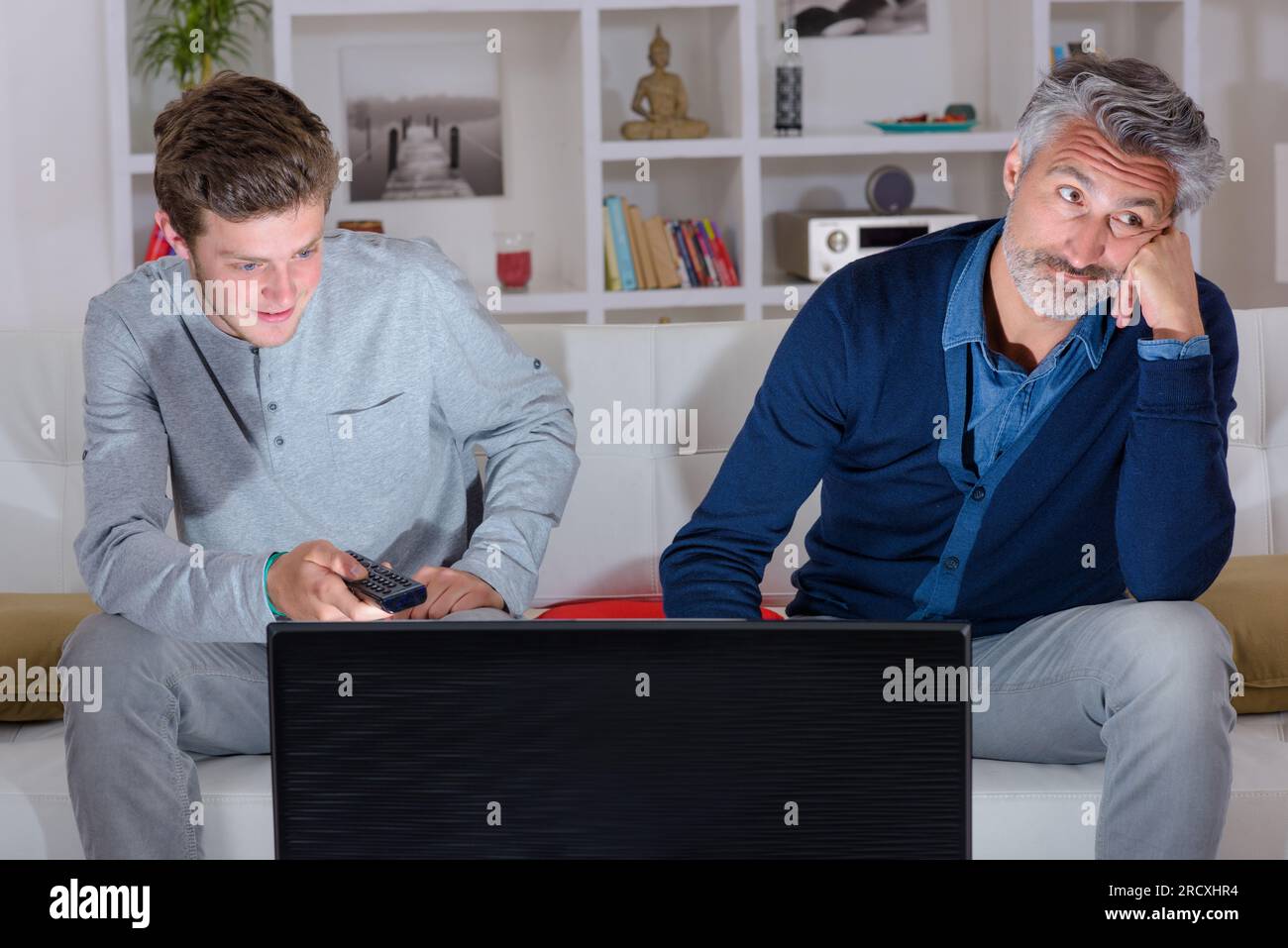son and father during relaxation time Stock Photo - Alamy