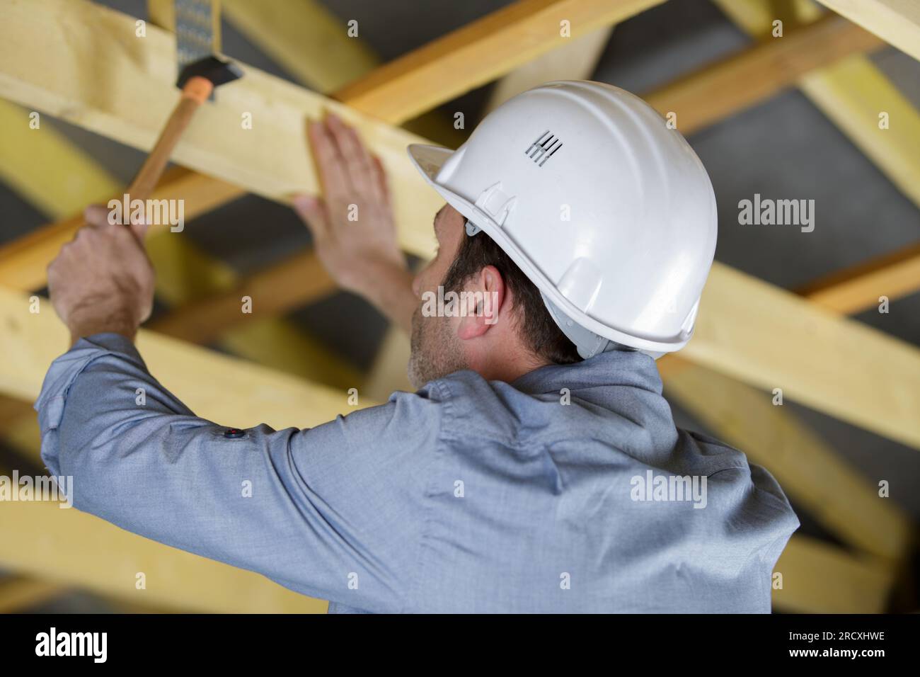 Woodworker male worker using hammer hi-res stock photography and images ...
