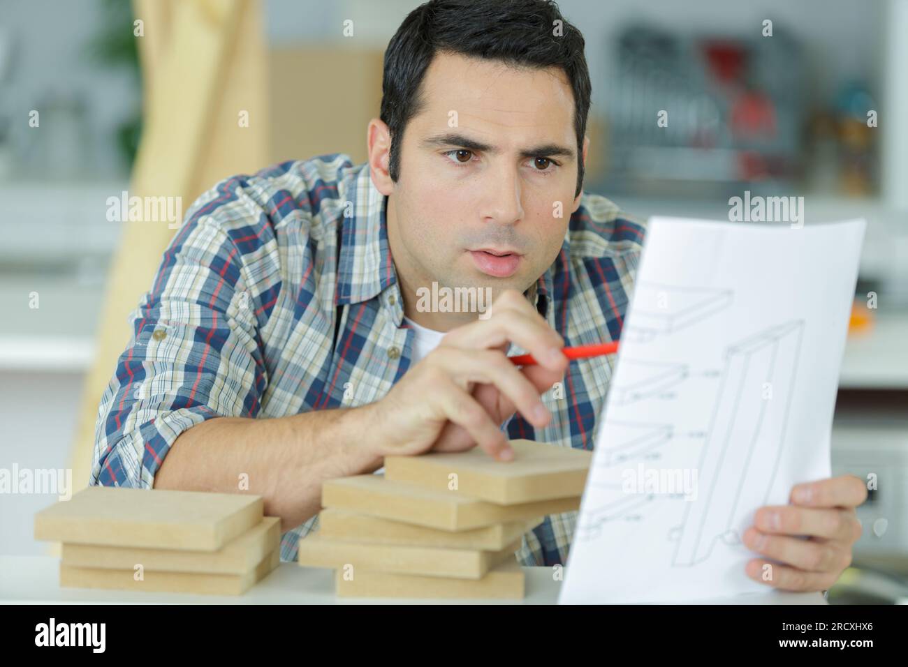 Reading a manual and fixing hi-res stock photography and images - Alamy