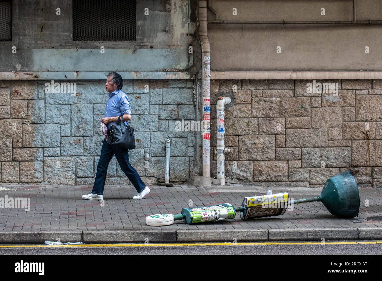 A bus stop succumbs to the strong winds of Typhoon Talim in Hong Kong ...