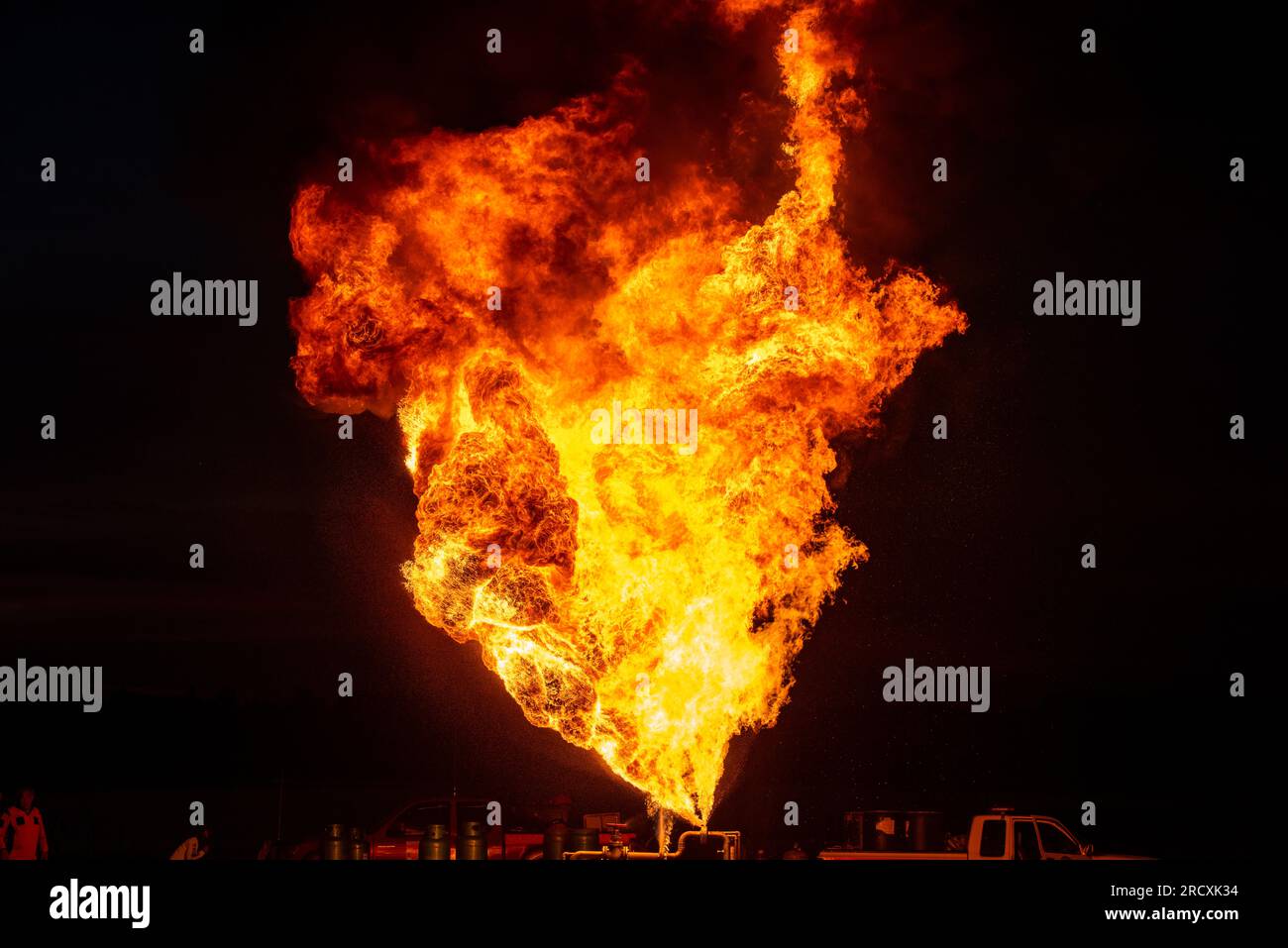 Firefighters and rescue training. Firefighter spraying high pressure ...