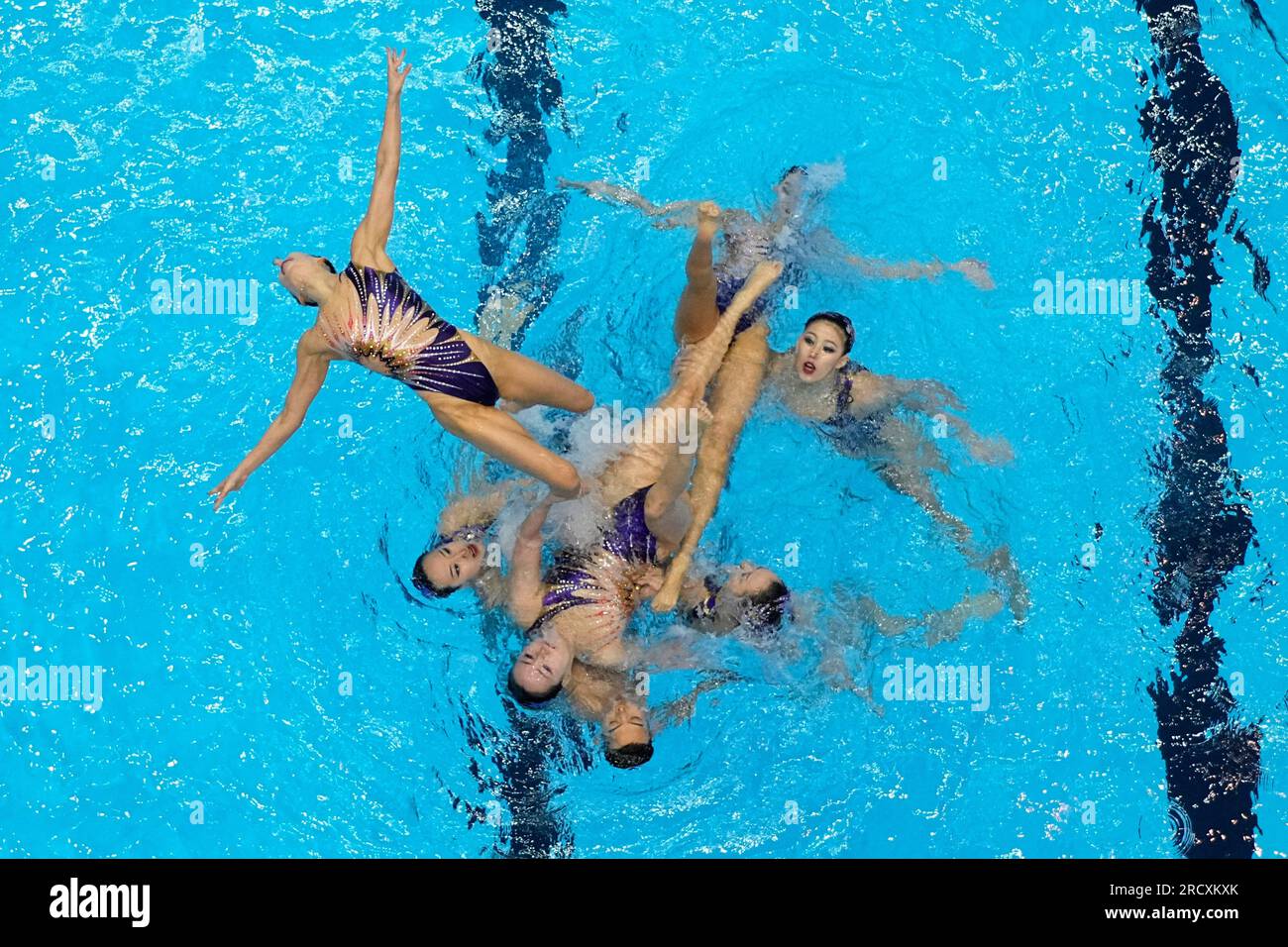 China team compete in the team acrobatic final of artistic swimming at ...