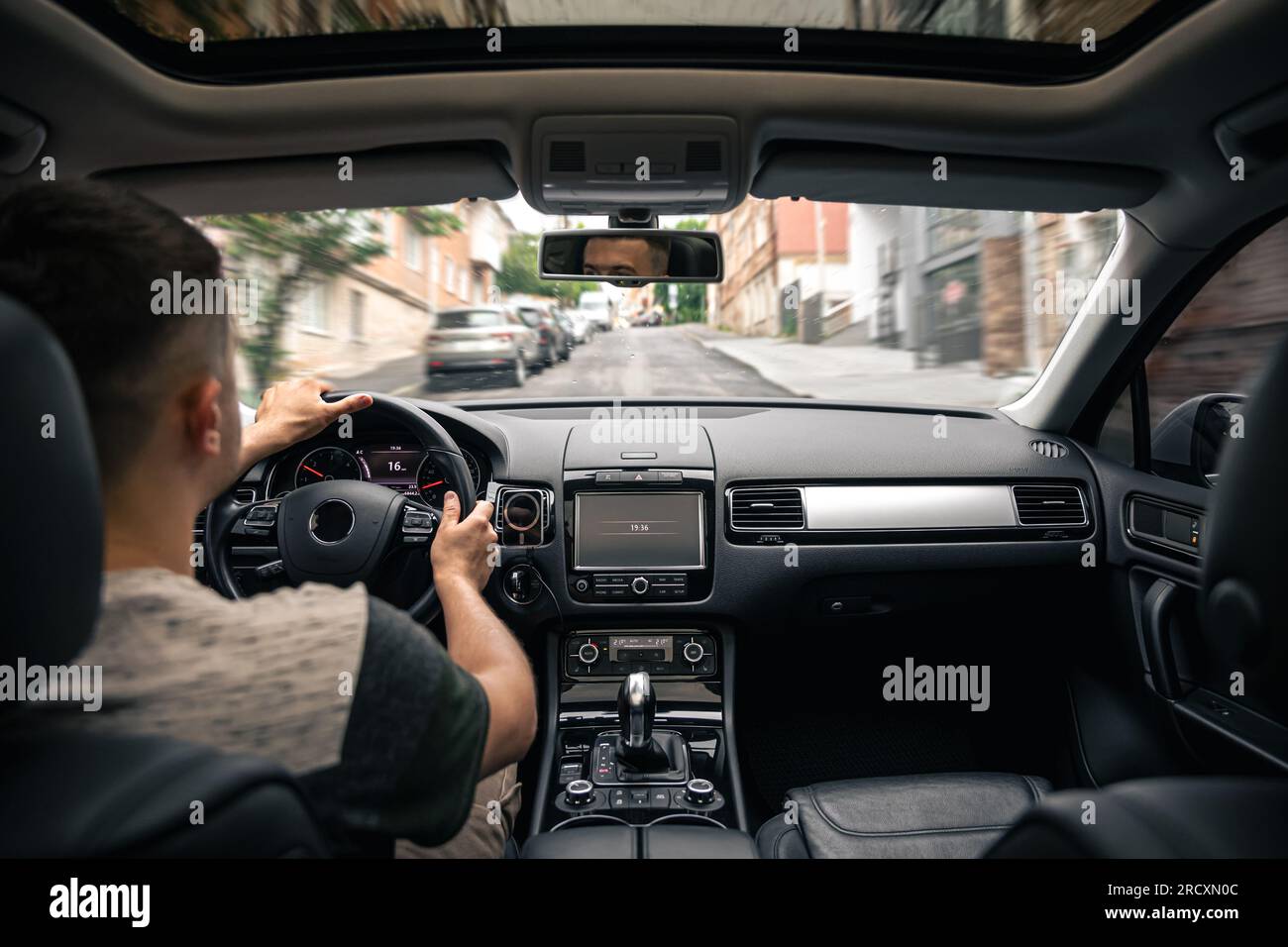 Hands on the wheel when driving at high speed from inside the car Stock ...