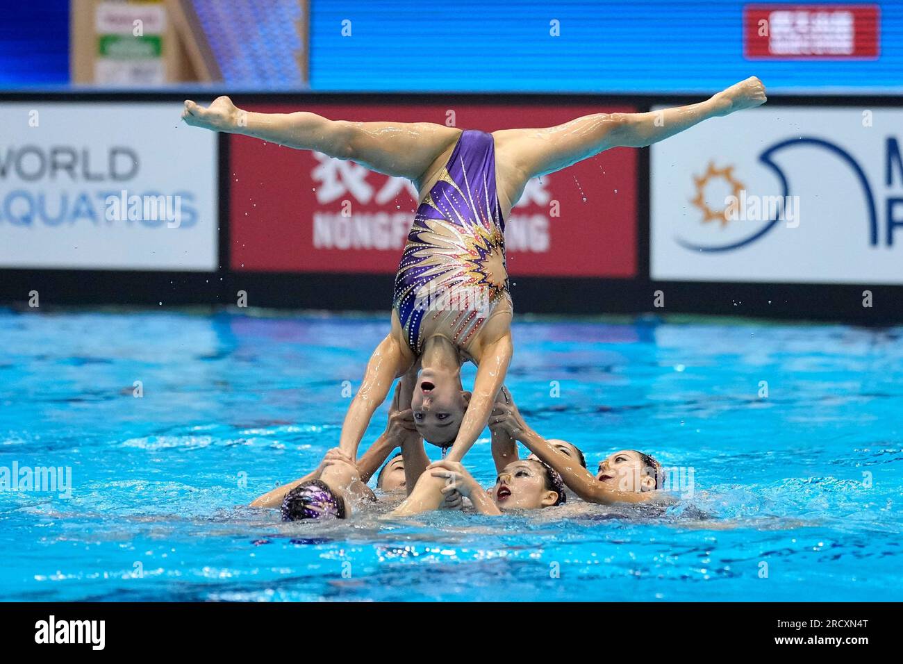 China team compete in the team acrobatic final of artistic swimming at ...