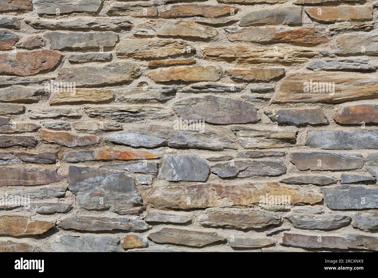 Retro stone wall texture. Natural stone wall background Stock Photo - Alamy