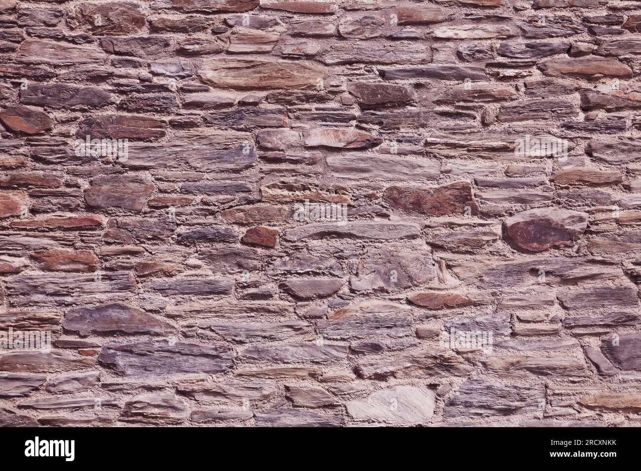 Retro stone wall texture. Natural stone wall background Stock Photo - Alamy