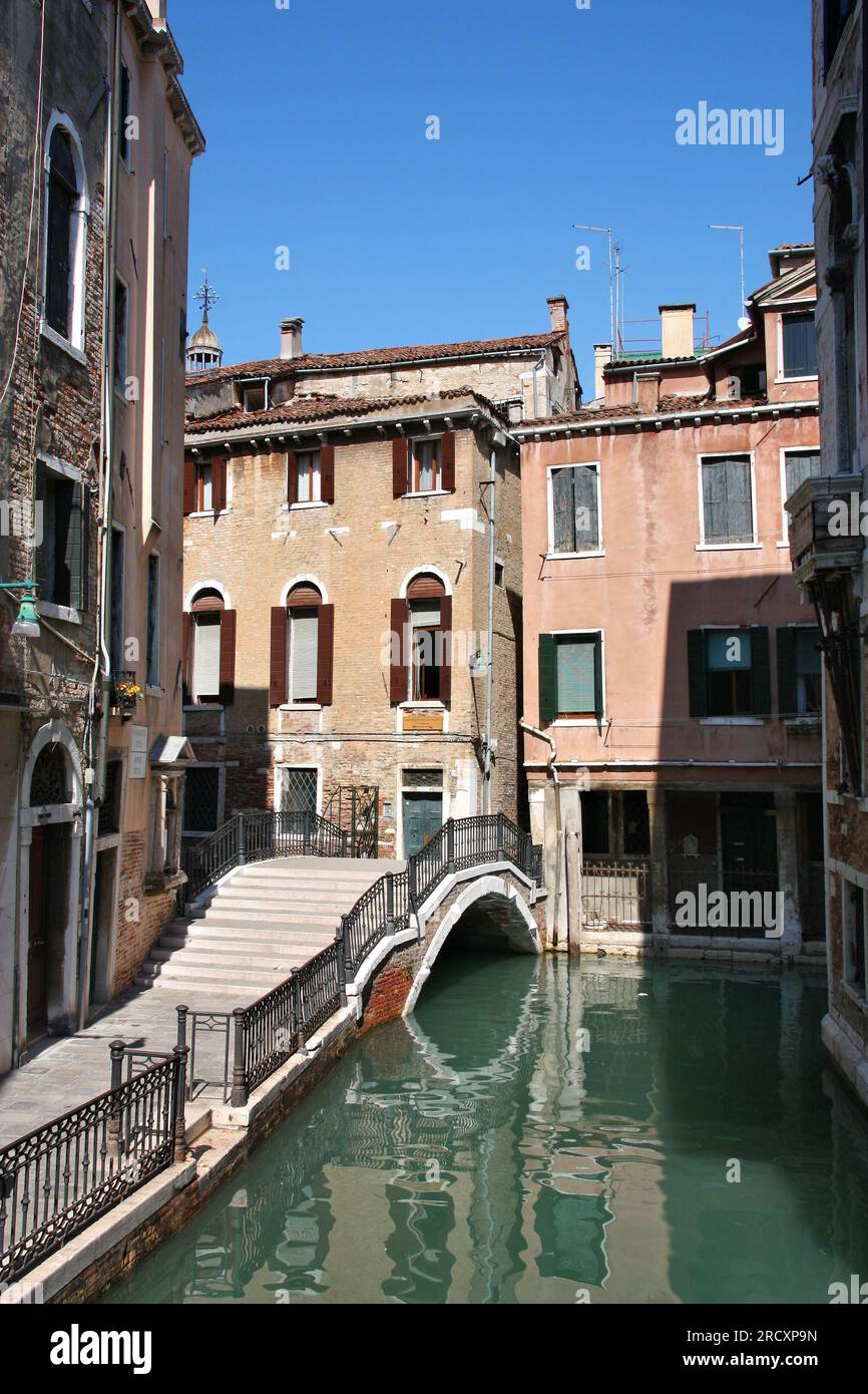 Venice city, Italy. Typical traditional canal view with a footbridge ...
