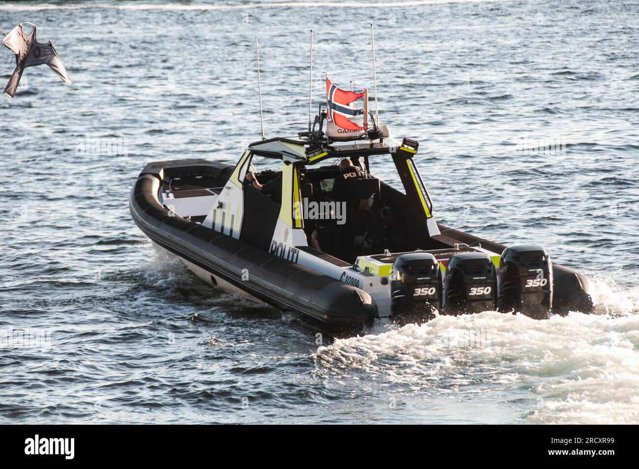 Around Oslo - Police launch setting out from the dock area Stock Photo ...