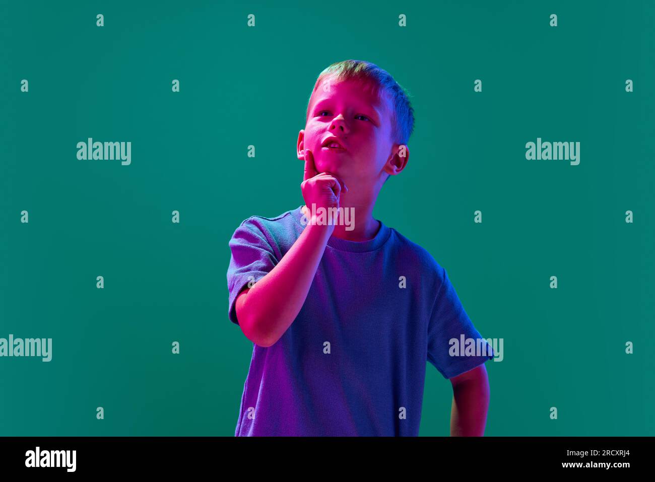 Portrait of little smart boy, child standing with thoughtful face ...