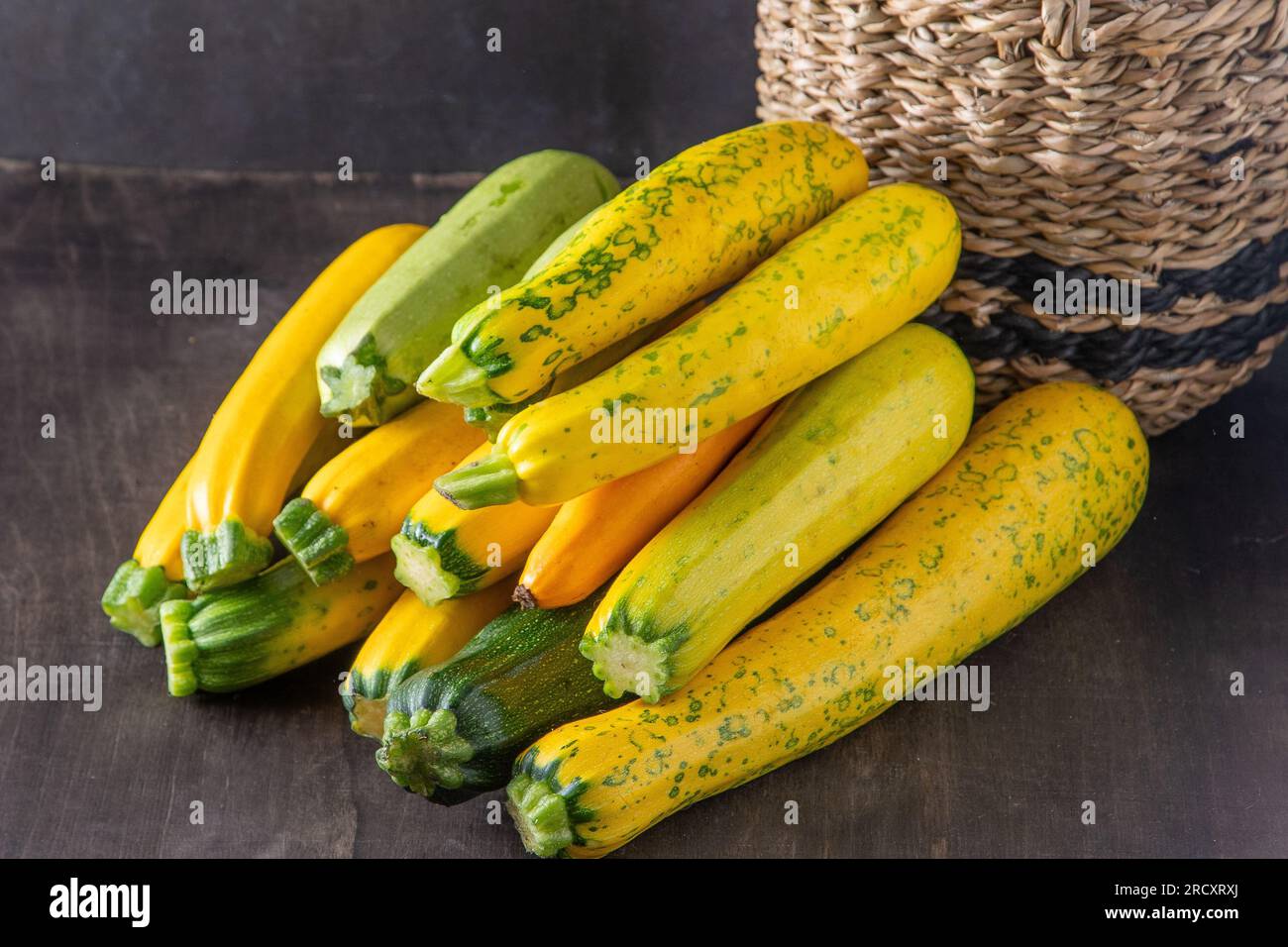 Yellow green leopard spotted zucchini. Vegetables on the table ...