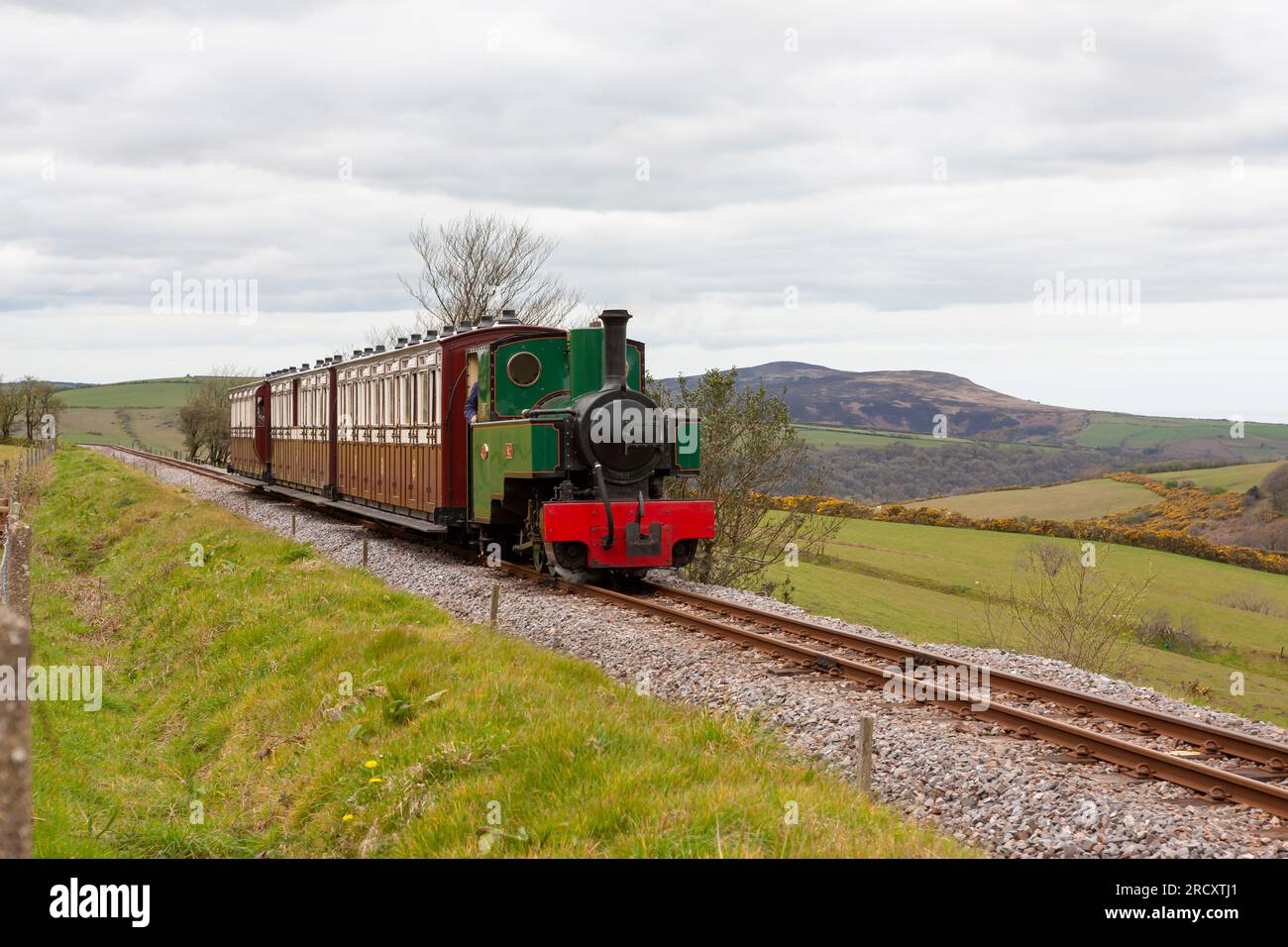 Steam train approaching Woody Bay station on the Lynton and Barnstaple ...