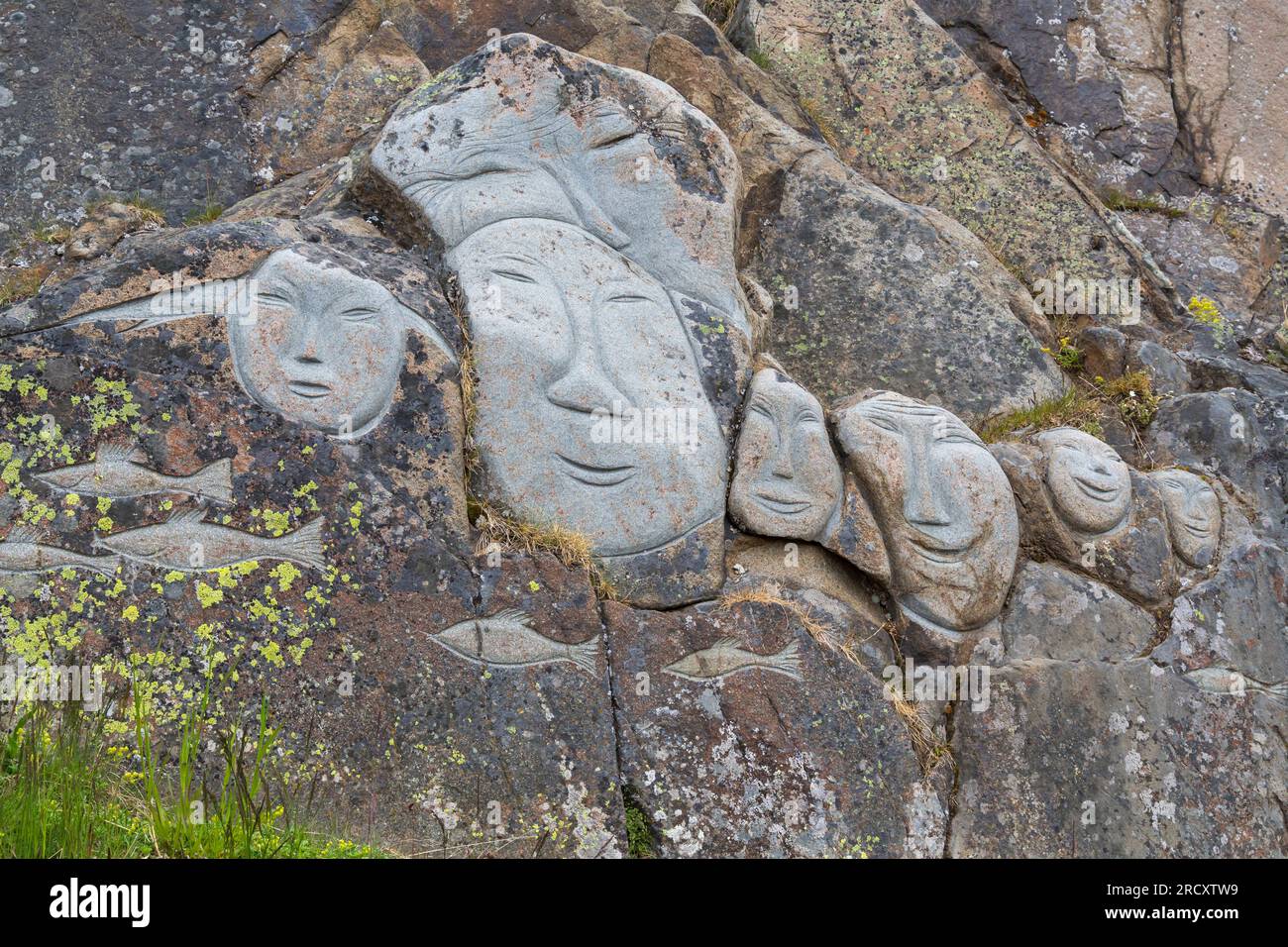 Faces, Rock art carvings, part of Stone & Man project by local artist ...