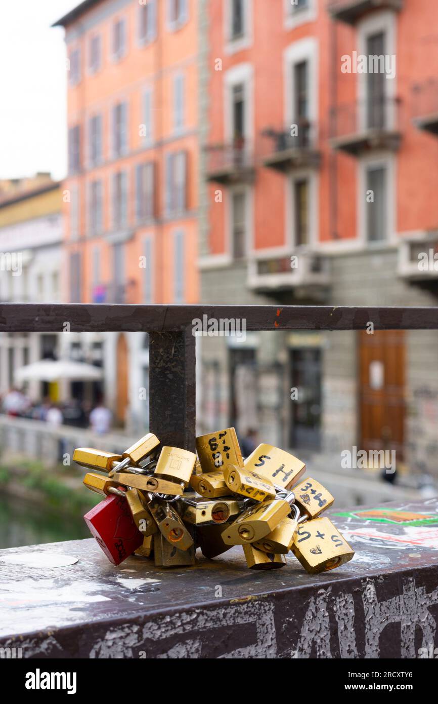 Locks on the bridge in the Navigli area - Milan, Italy Stock Photo - Alamy