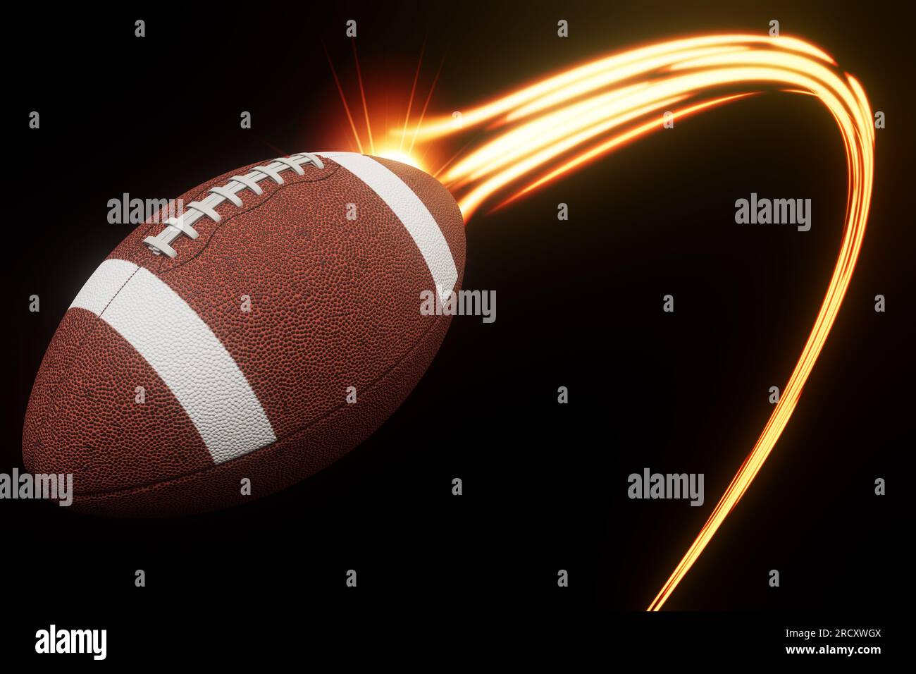 A american football sport ball flying through the air with a flowing ...