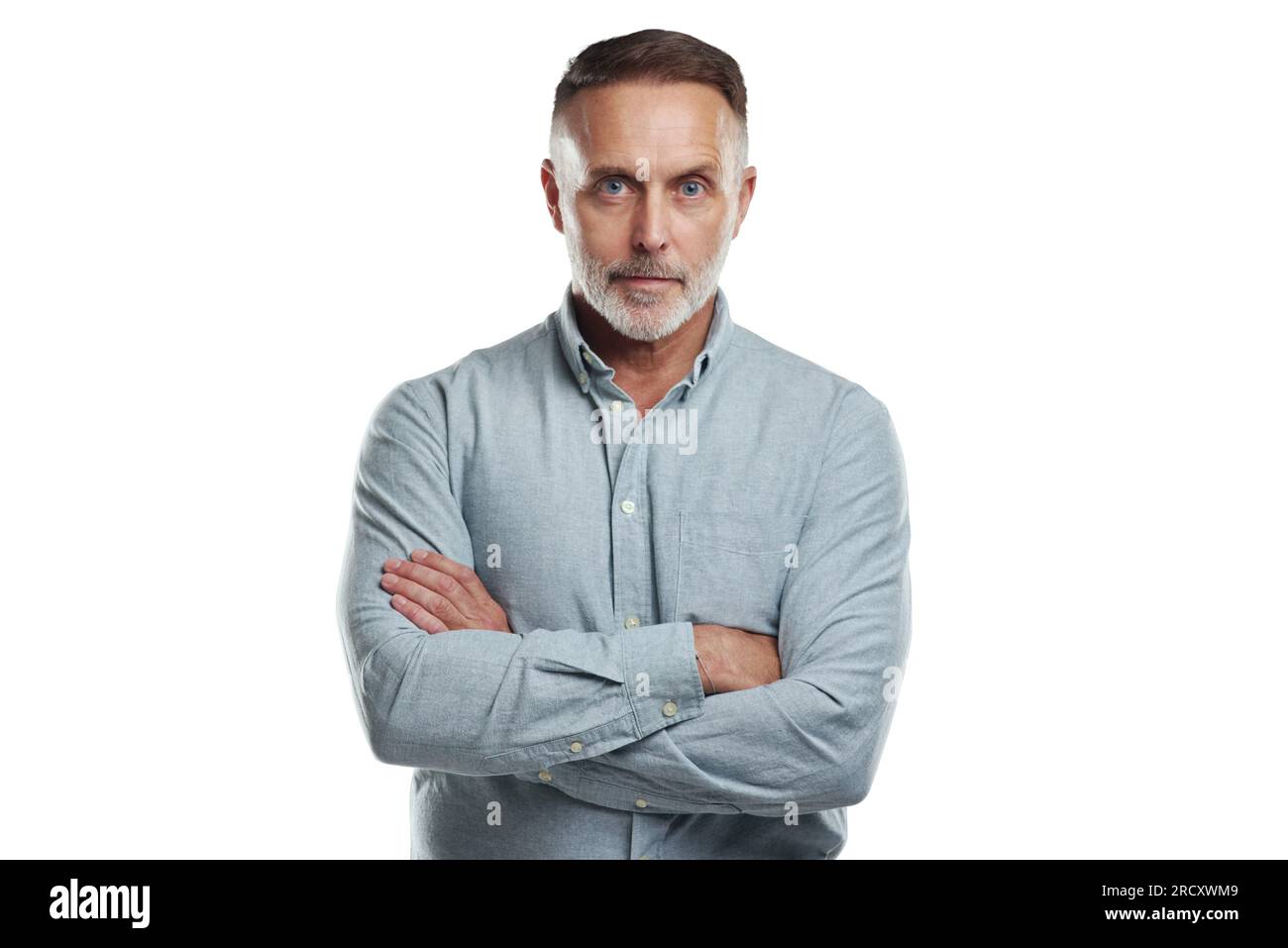 Portrait of confident man with arms crossed and serious face isolated ...