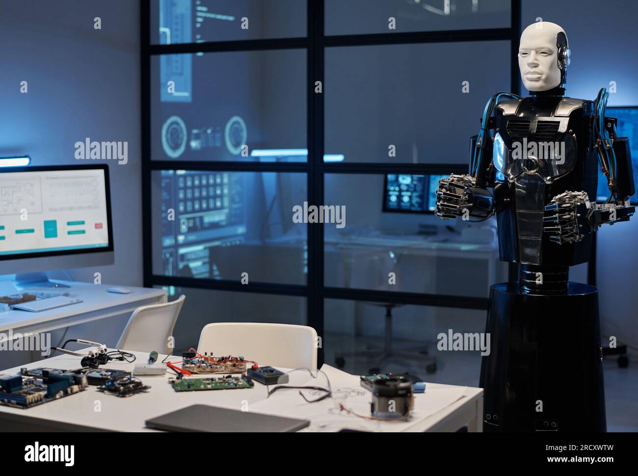 Robot cyborg with artificial intelligence standing in the laboratory ...