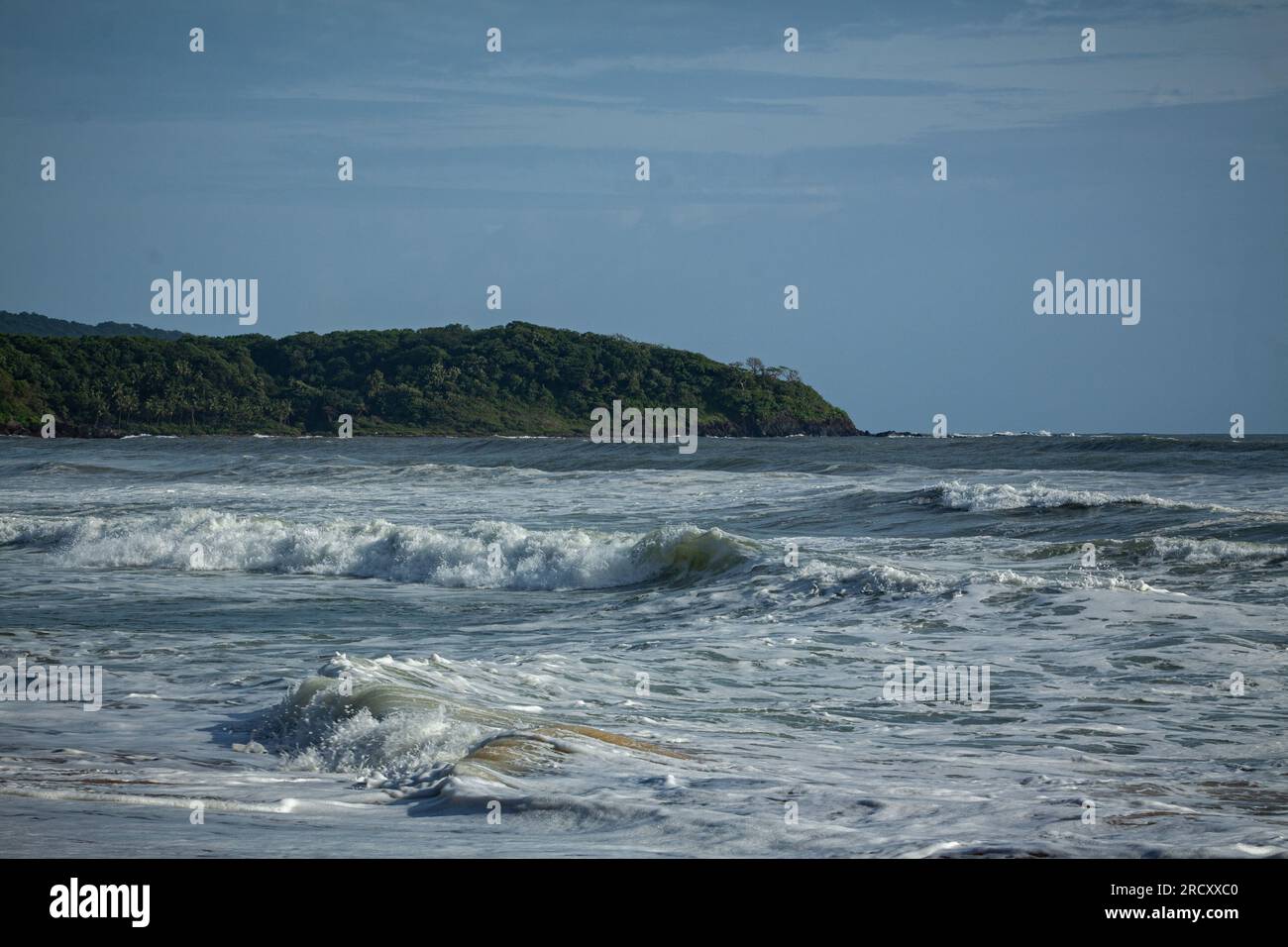 sea with breathtaking view; ocean view with waves and hills Stock Photo ...