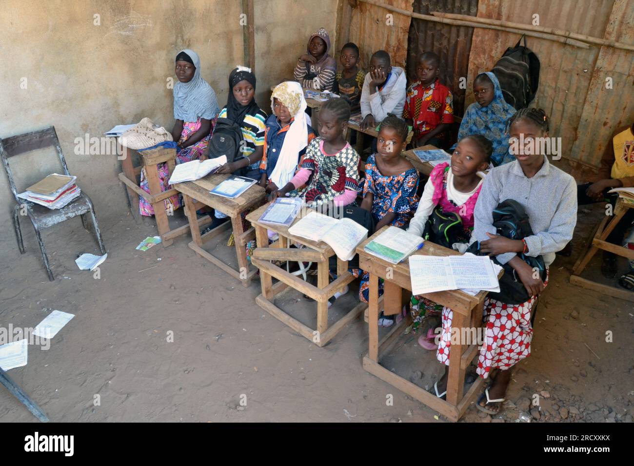 Young Malian students in a makeshift classroom of a private school in ...