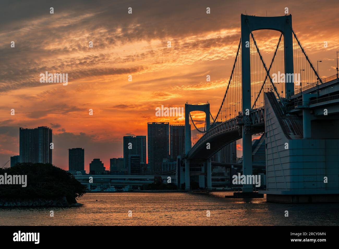 Beautiful sunset colors and clouds above the city of Tokyo and Rainbow ...