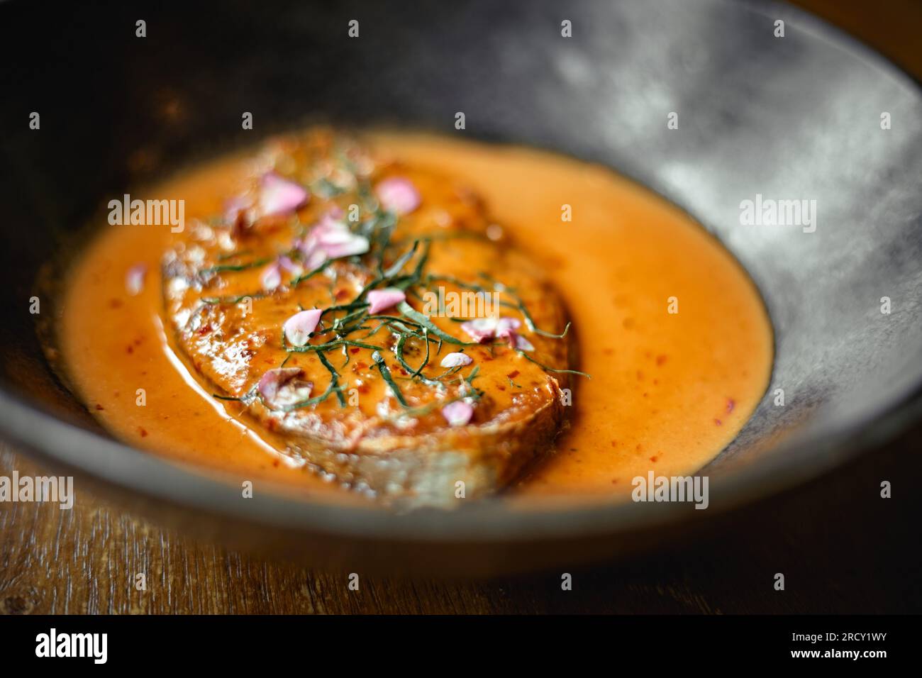 Fish in Thai Red Curry Chili Sauce ,Popular Thai food Stock Photo - Alamy