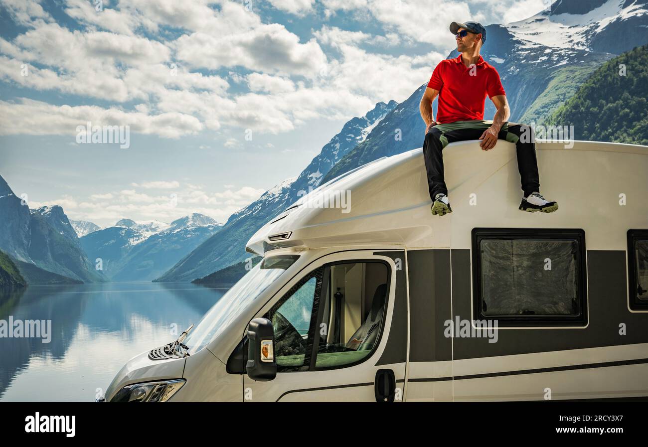 RV Motor Home Owner on His Norwegian Vacation. Seating on a Camper Van ...