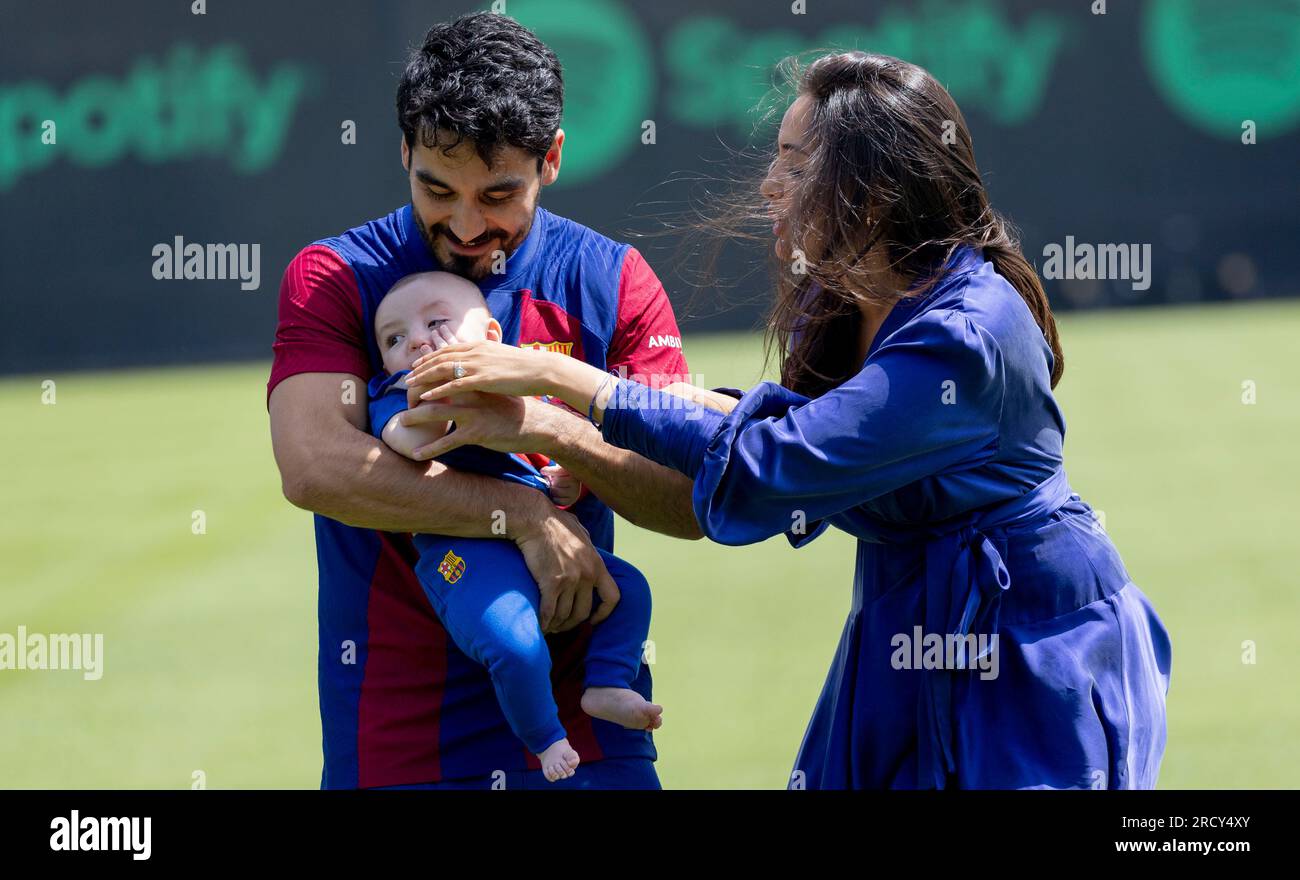 German midfielder Ilkay Gundogan, left, with his wife Sara Arfaoui and ...