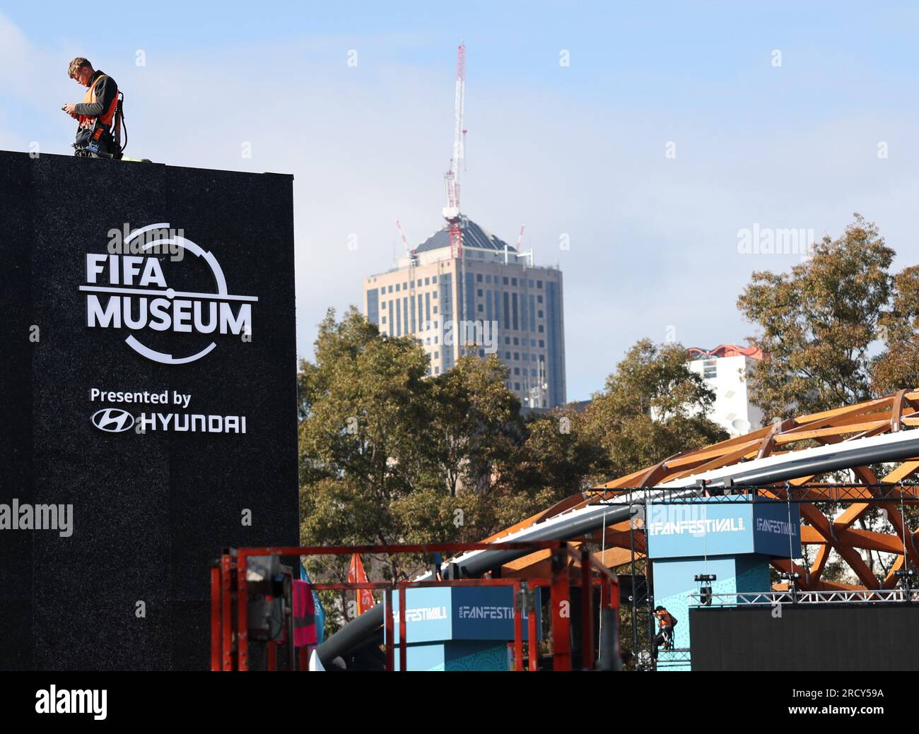 Sydney. 17th July, 2023. A worker is seen on the roof of FIFA Museum in ...
