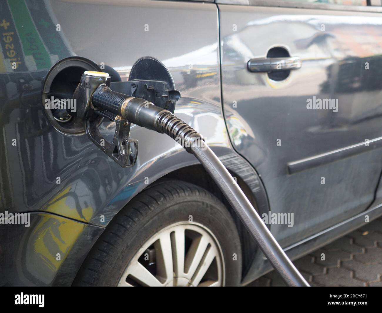 Cremona, Italy - July 3 20223 female attendant servicing a client at ...