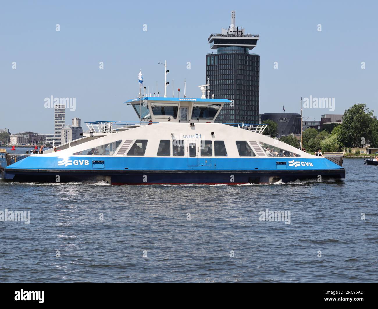 Ferries in Amstel River in Amsterdam, Netherlands Stock Photo - Alamy