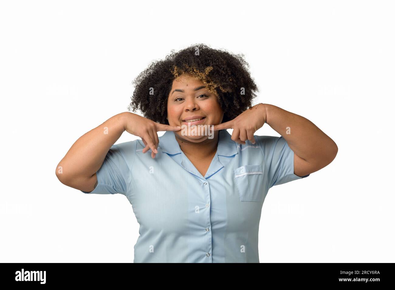 Waist up portrait of young Afro-Latina female dentist of Venezuelan ...