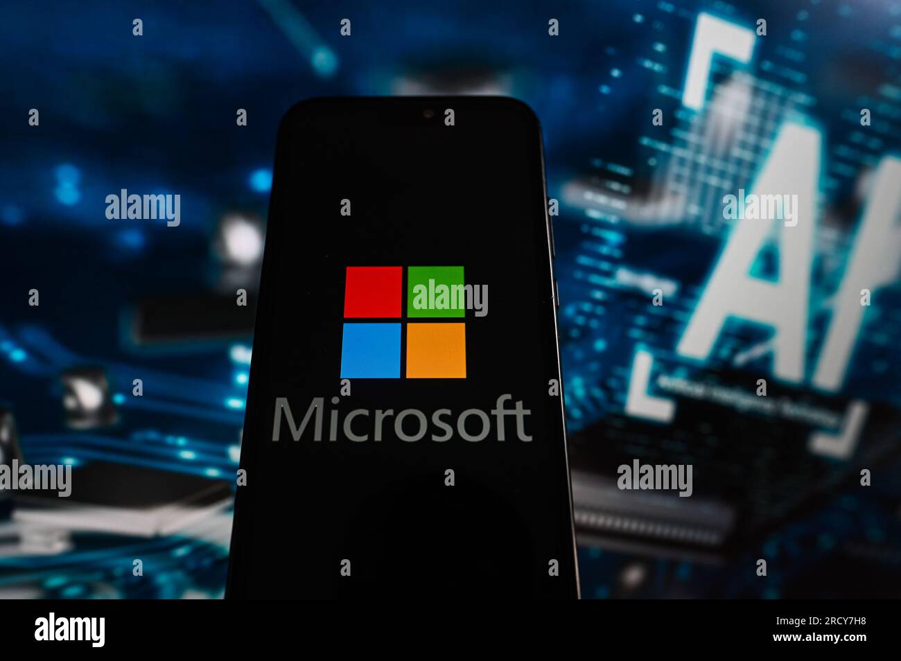 In this photo illustration, Microsoft logo is displayed on a smartphone with artificial ...