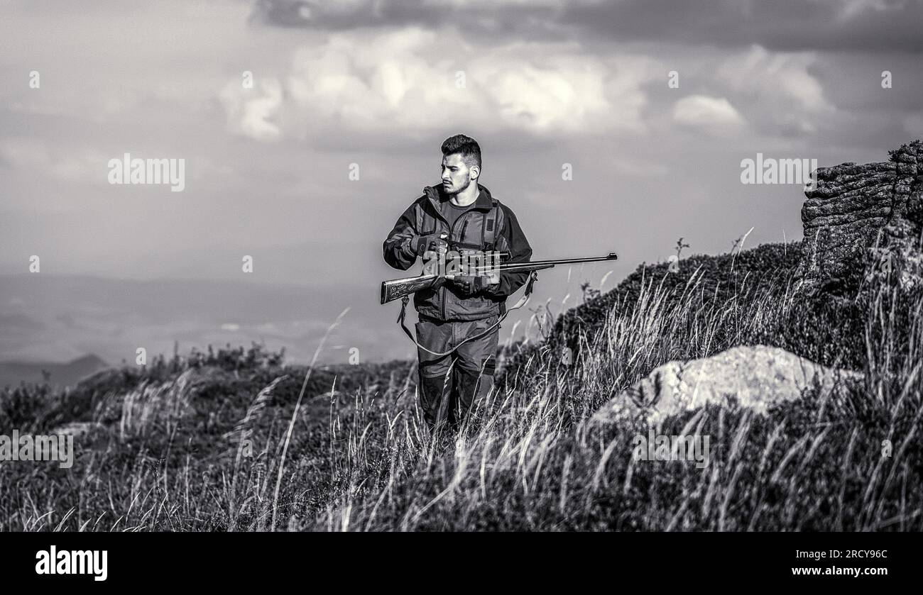 Hunter man. Male with a gun. Hunter with hunting gun and hunting form ...