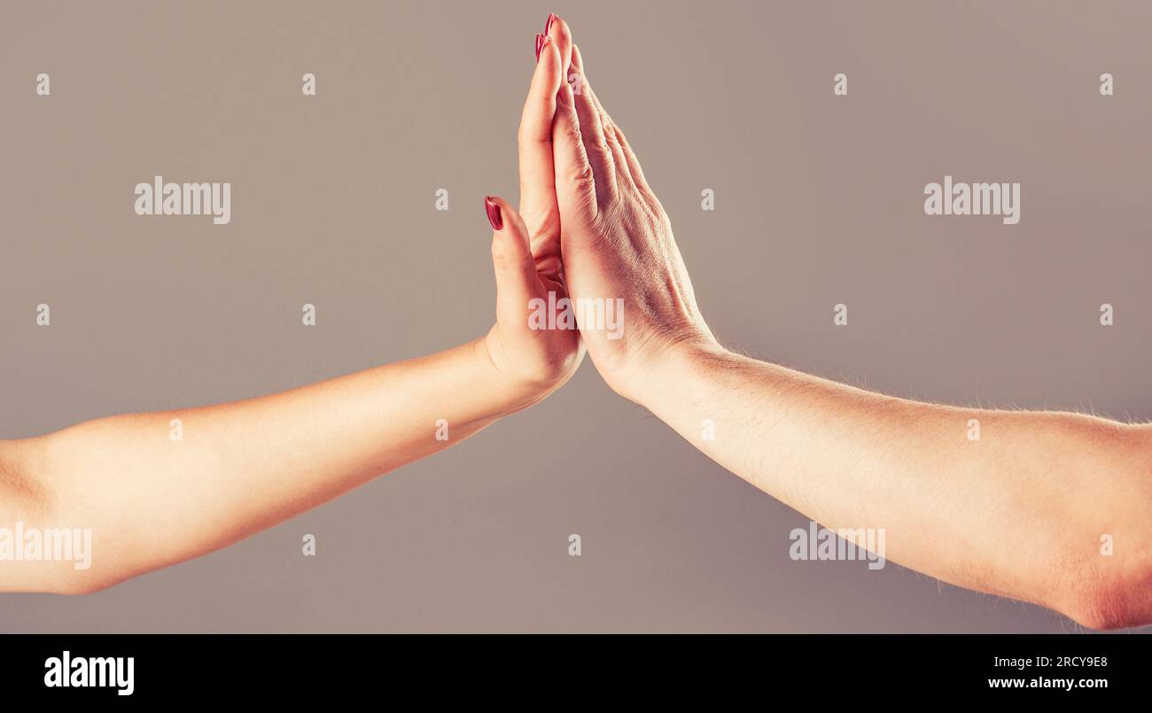 High-five gesture and tenderness of friendship between man and woman ...