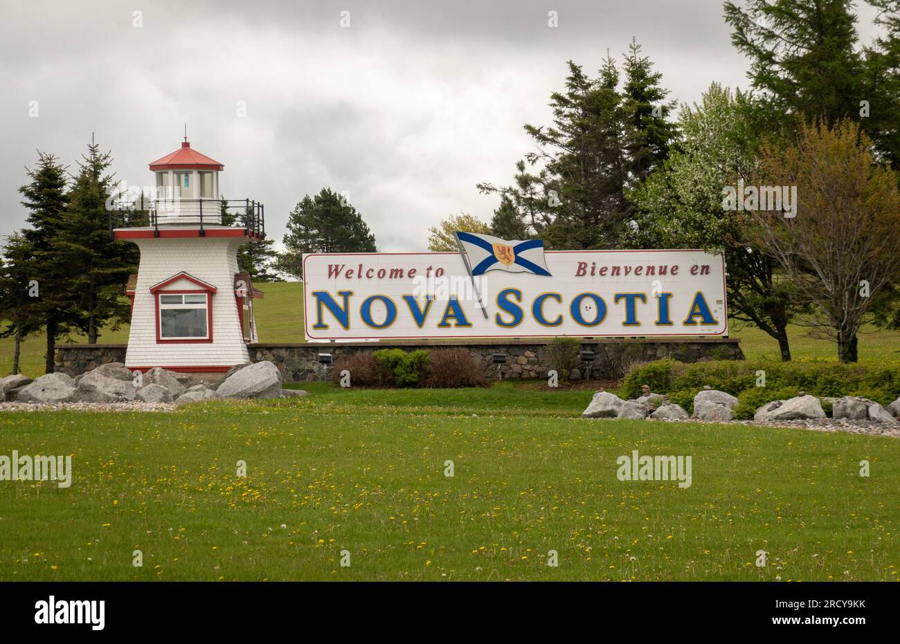 Bienvenue flag lawn grass info visitors centre hi-res stock photography ...
