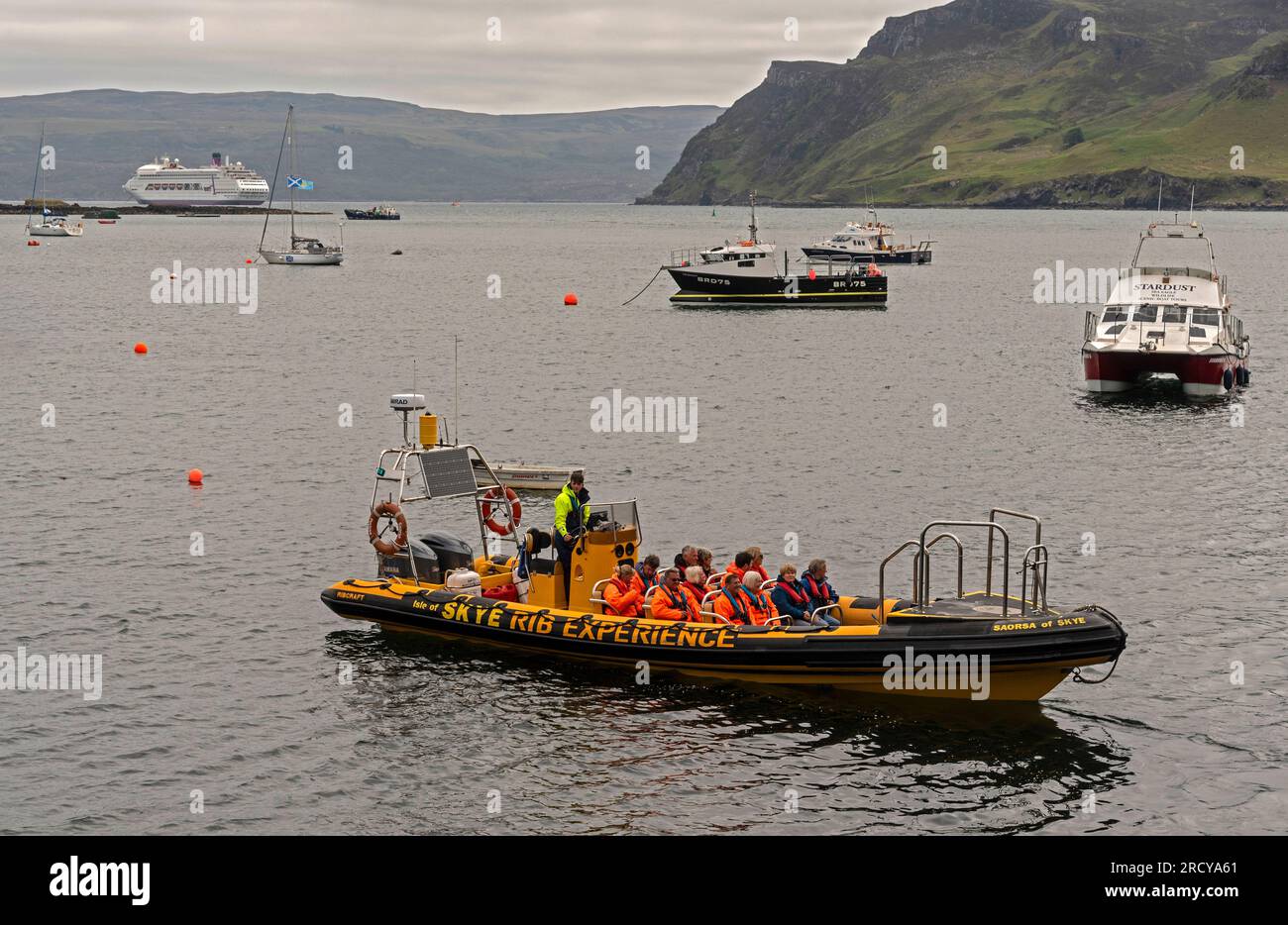 Portree, Isle of Skye, Scotland, UK. 5 June 2023. Tourists aboard an inflatable rib for a Skye ...