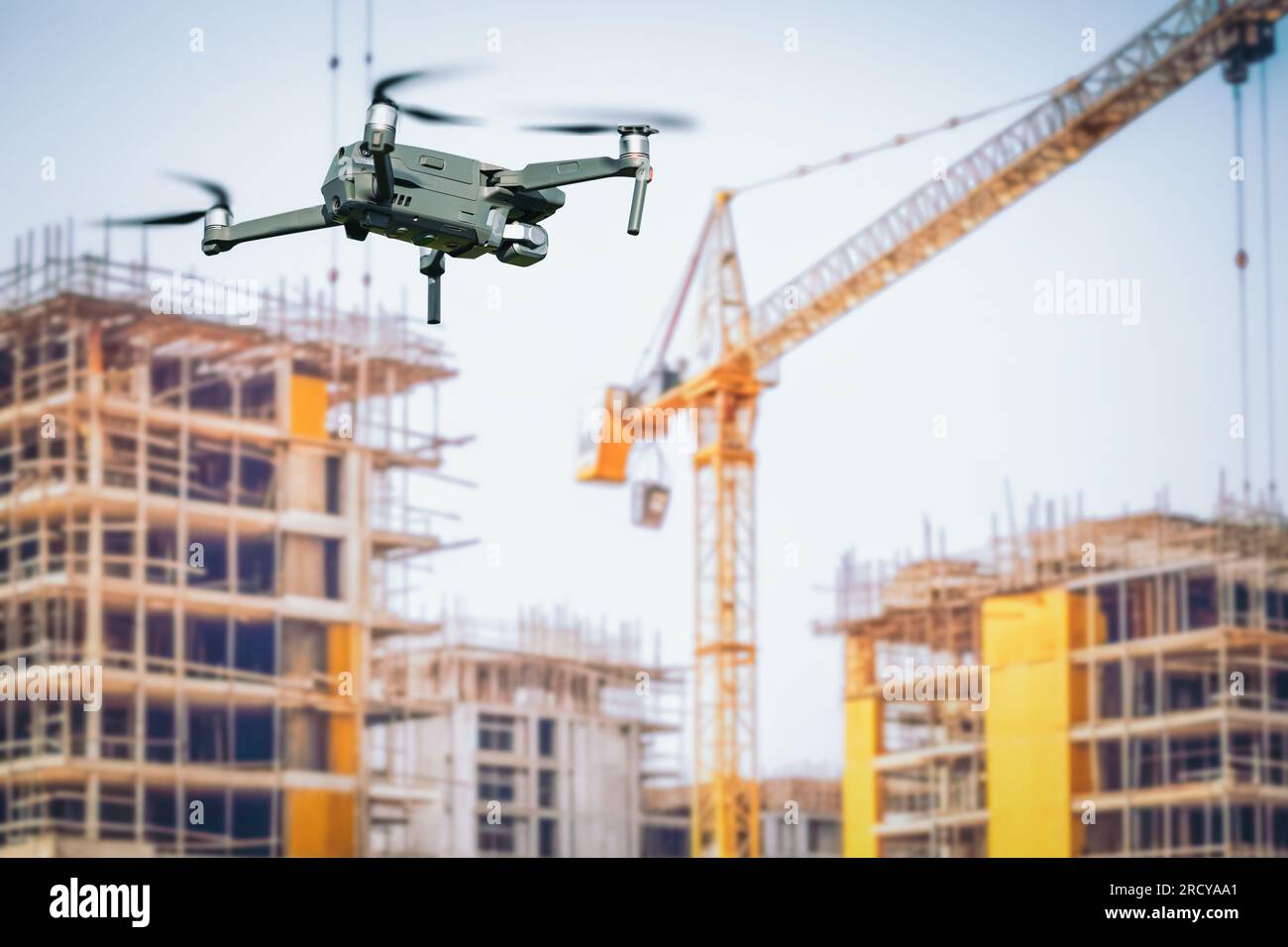 Drone over construction site. video surveillance or industrial ...