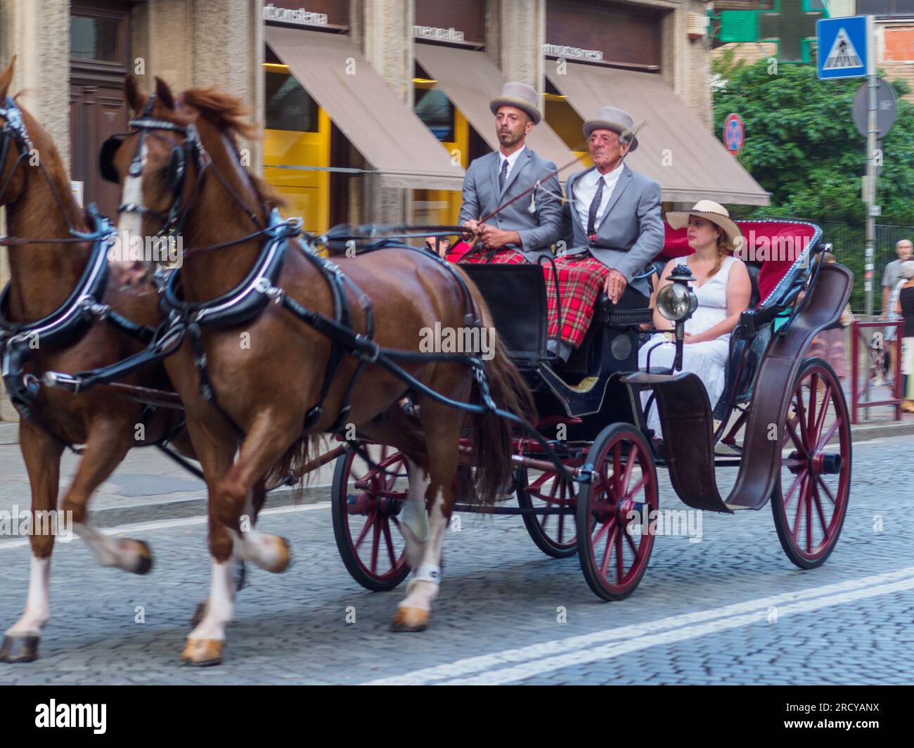 Ivrea, Torino - July 7 2023 People antique dressed for historical horse ...