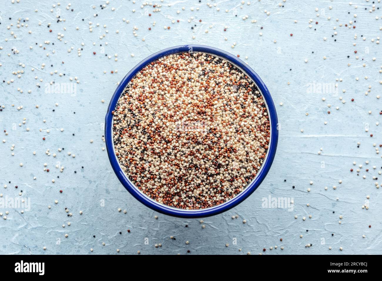 Quinoa mix. Mixed white, red and black quinoa seeds in a bowl, top shot ...