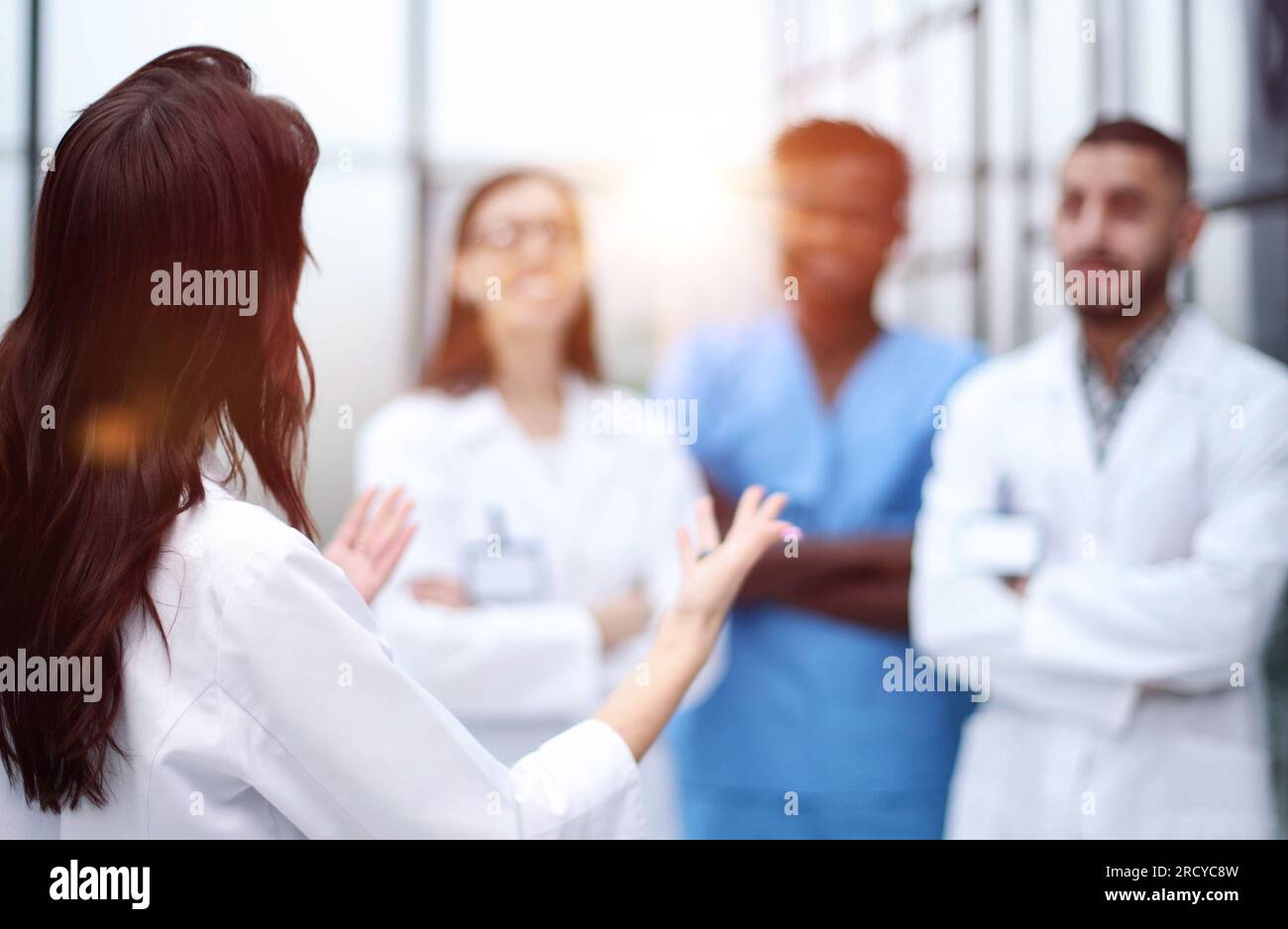 Group of medicine doctors talking during conference Stock Photo - Alamy