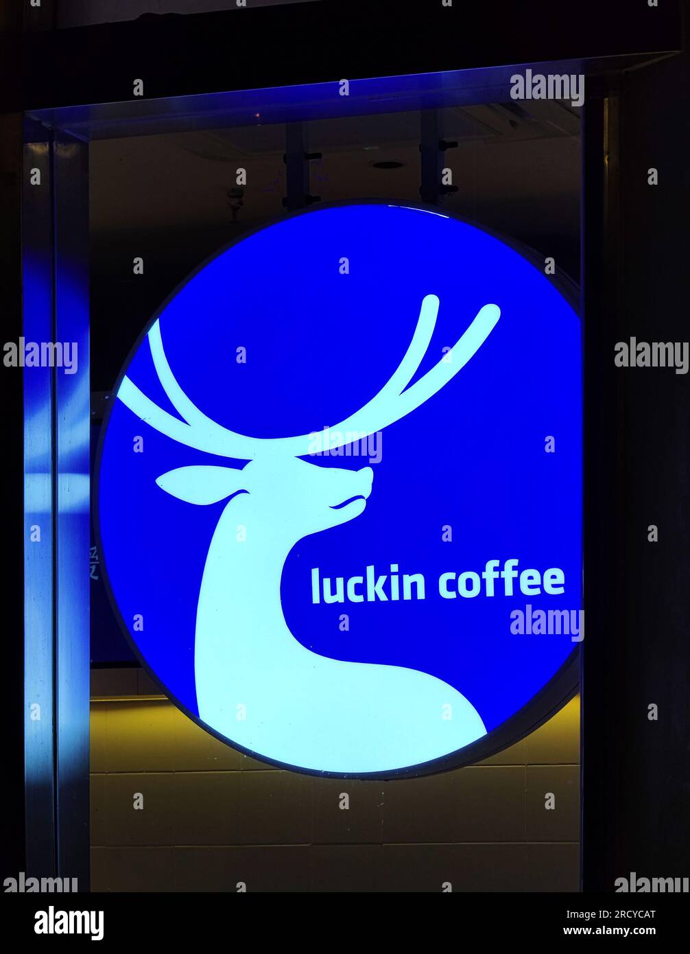 Luckin Coffee shop exterior blue and white logo sign Stock Photo - Alamy
