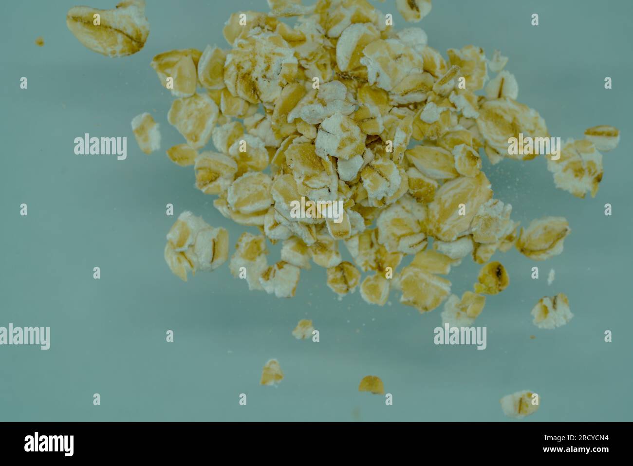 Oatmeal is a whole grain cereal product made from seed oats Stock Photo ...