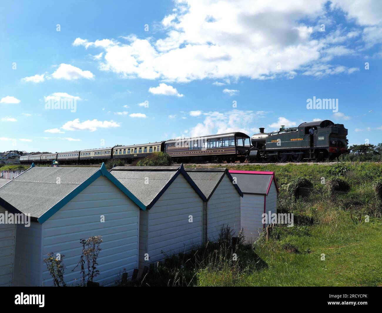 Tank engine Great Western pulling seven coaches passing Goodrington ...