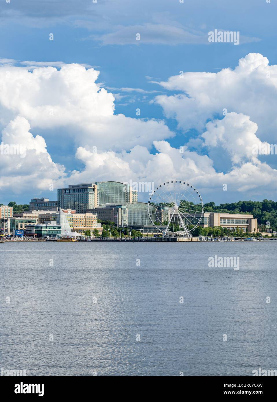 Dramatic summer clouds above panoramic skyline of National Harbor near ...