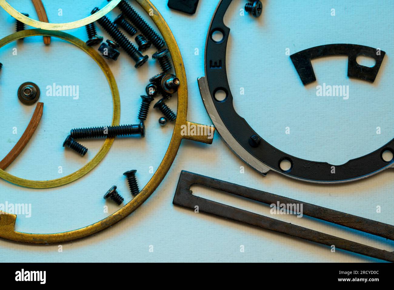 Clean and disassemble the lens for photography into its component parts ...