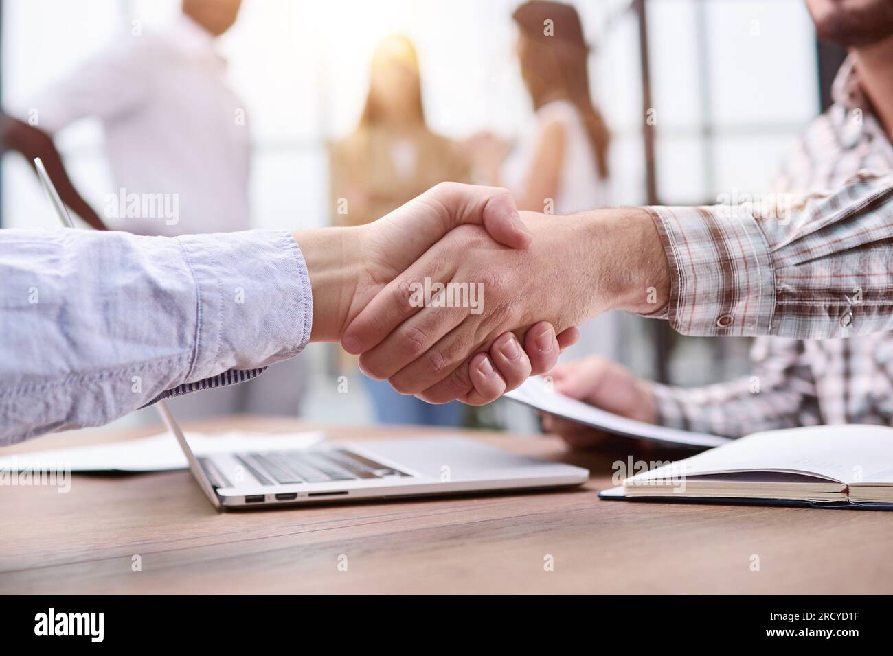 Partnering up to get the job done faster Stock Photo - Alamy