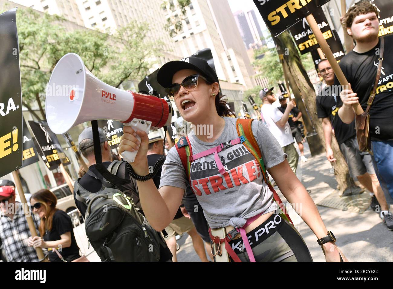 Picketers carry signs outside NBC in Rockefeller Center on Monday, July ...